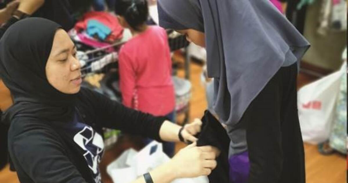 UNIQLO clothing treat for refugees on World Refugee Day | UNHCR Malaysia