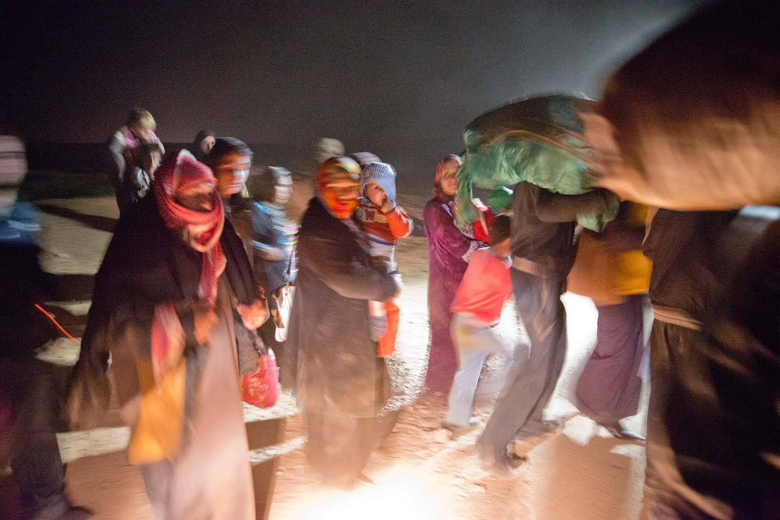 Escaping Syria in the dead of night: UNHCR chief visits Jordan border ...