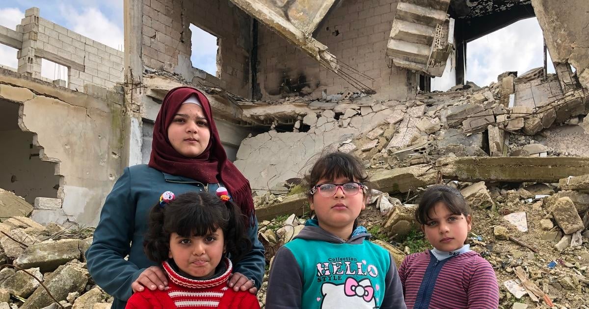 Syrian family come home to a town ravaged by war | UNHCR