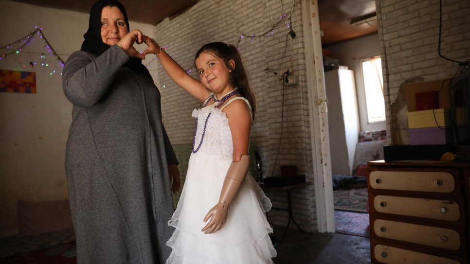 UNHCR - Child's joy helps Syrian refugee family weather Lebanon's ...